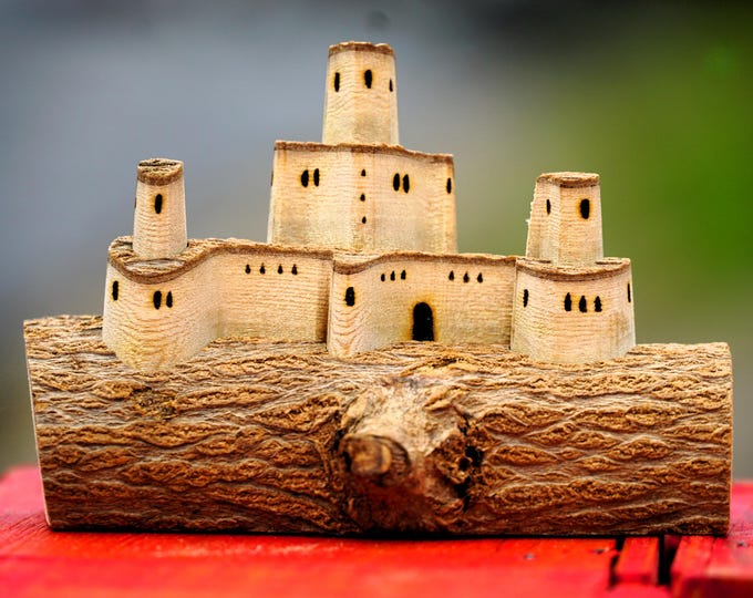 Wooden Pop up Castle Carved From a Garden Tree Log Expending Into a ...