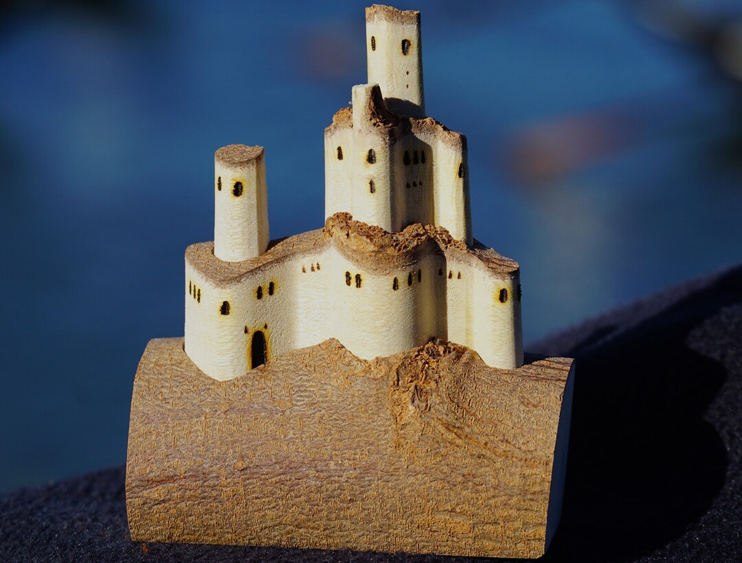 Wooden Pop up Castle Carved From a Garden Tree Log Expending Into a ...