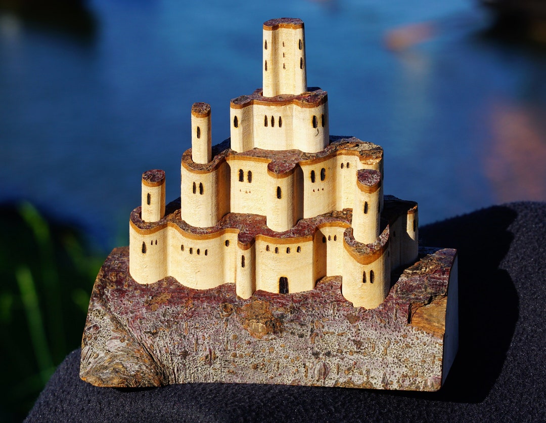Wooden Pop up Castle Carved From a Driftwood Log Expending Into a ...