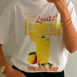 Louis Lemonade Tshirt- APRES- Louis Merch, A Little Taste is All You ...