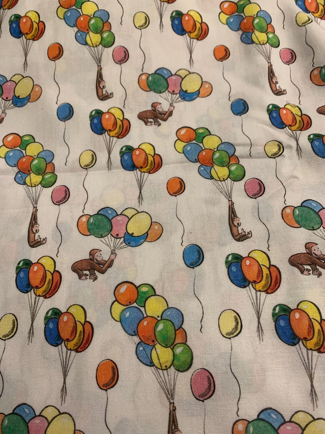 Curious George Fabric , Curious George Balloon Toss Licensed Cotton ...