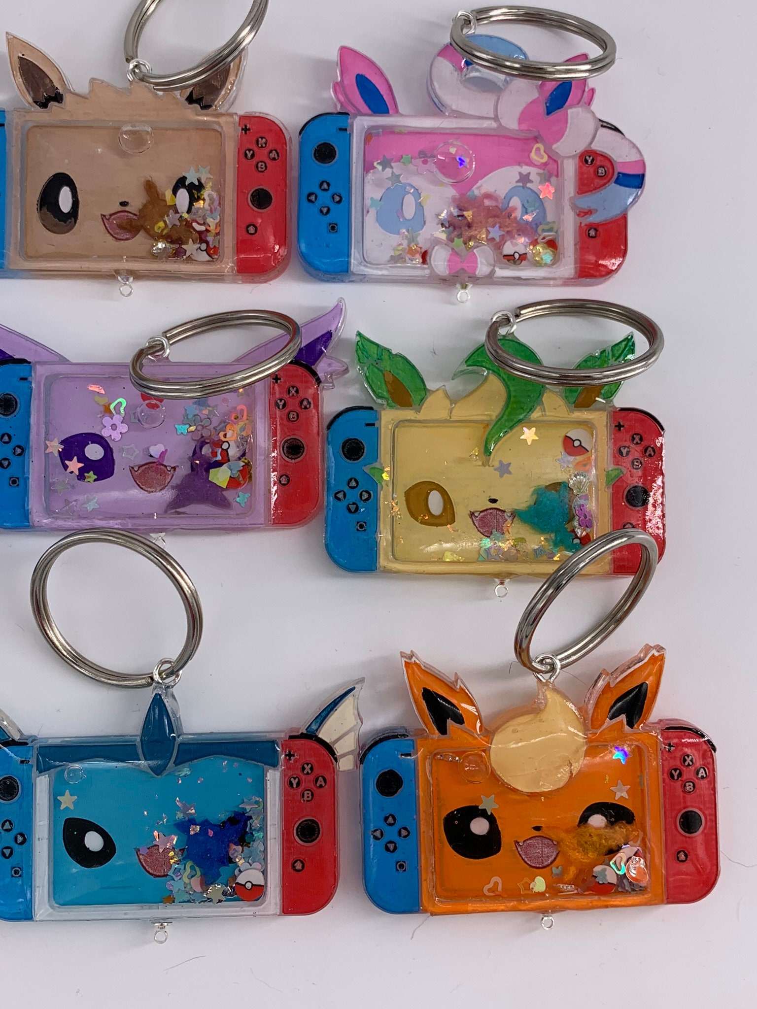 Anime Poke Switch Eeveelution Shaker Keychains, Eevee, Umbreon, Leafeon ...