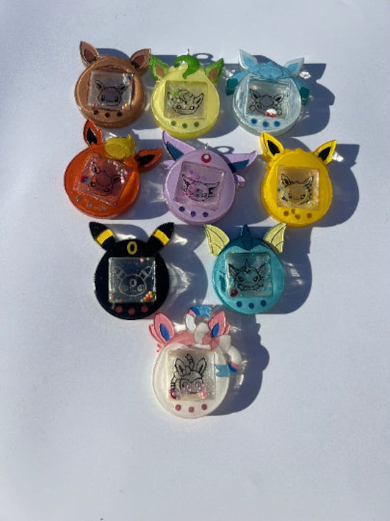 Anime Poke Eeveelution Tomagotchi, Keychains, Eevee, Umbreon, Flareon ...
