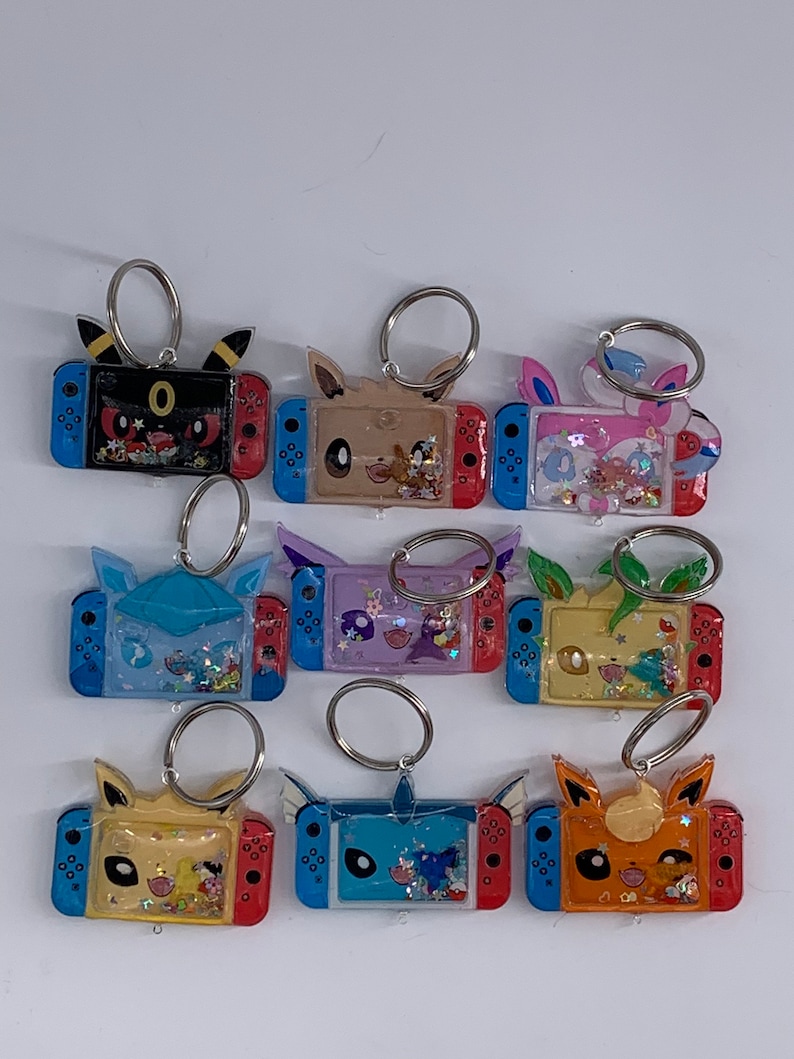 Anime Poke Switch Eeveelution Shaker Keychains, Eevee, Umbreon, Leafeon ...