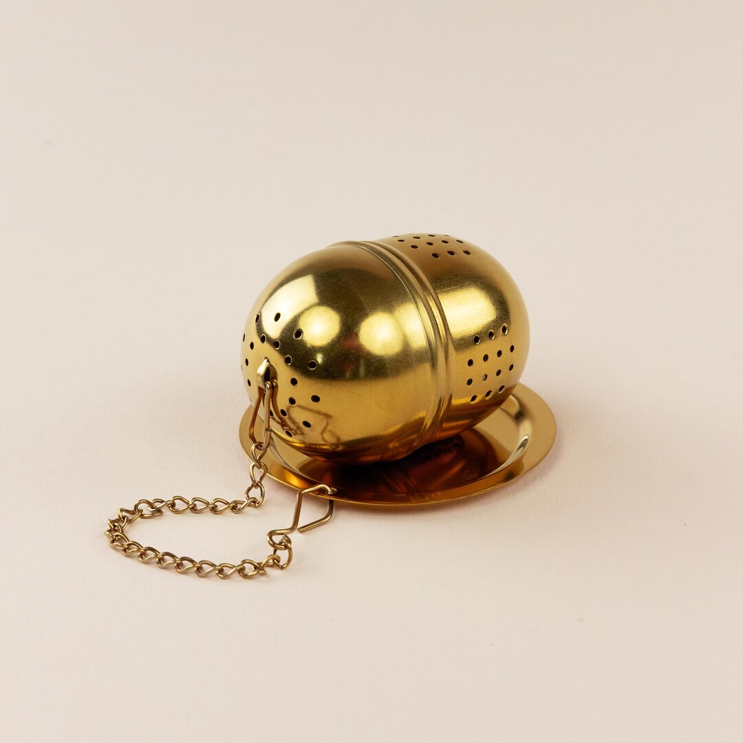Stainless Steel Golden Tea Egg With Chain & Resting Tray | Tea Infuser ...