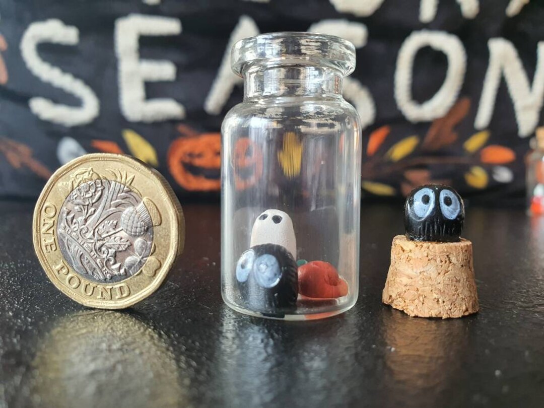 Inner Daemon Caught in a Glass Bottle With a Ghost and Pumpkin ...