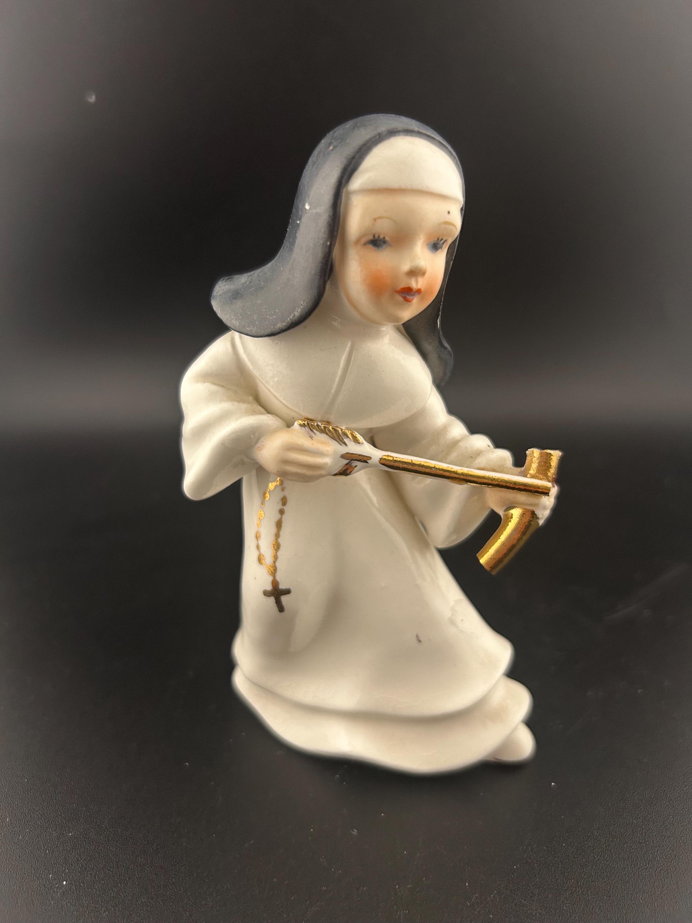 Vintage NAPCO Japan Ceramic Catholic Nun With Arrow and Broken Bow. as ...