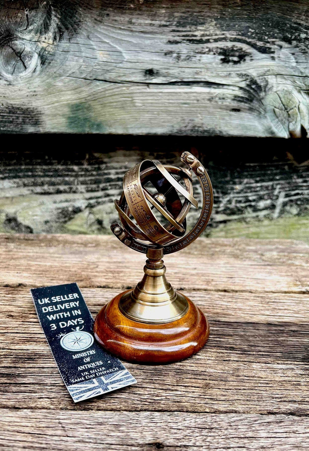 Vintage Armillary Sphere on Elegant Wooden Base: A Nostalgic Decor ...