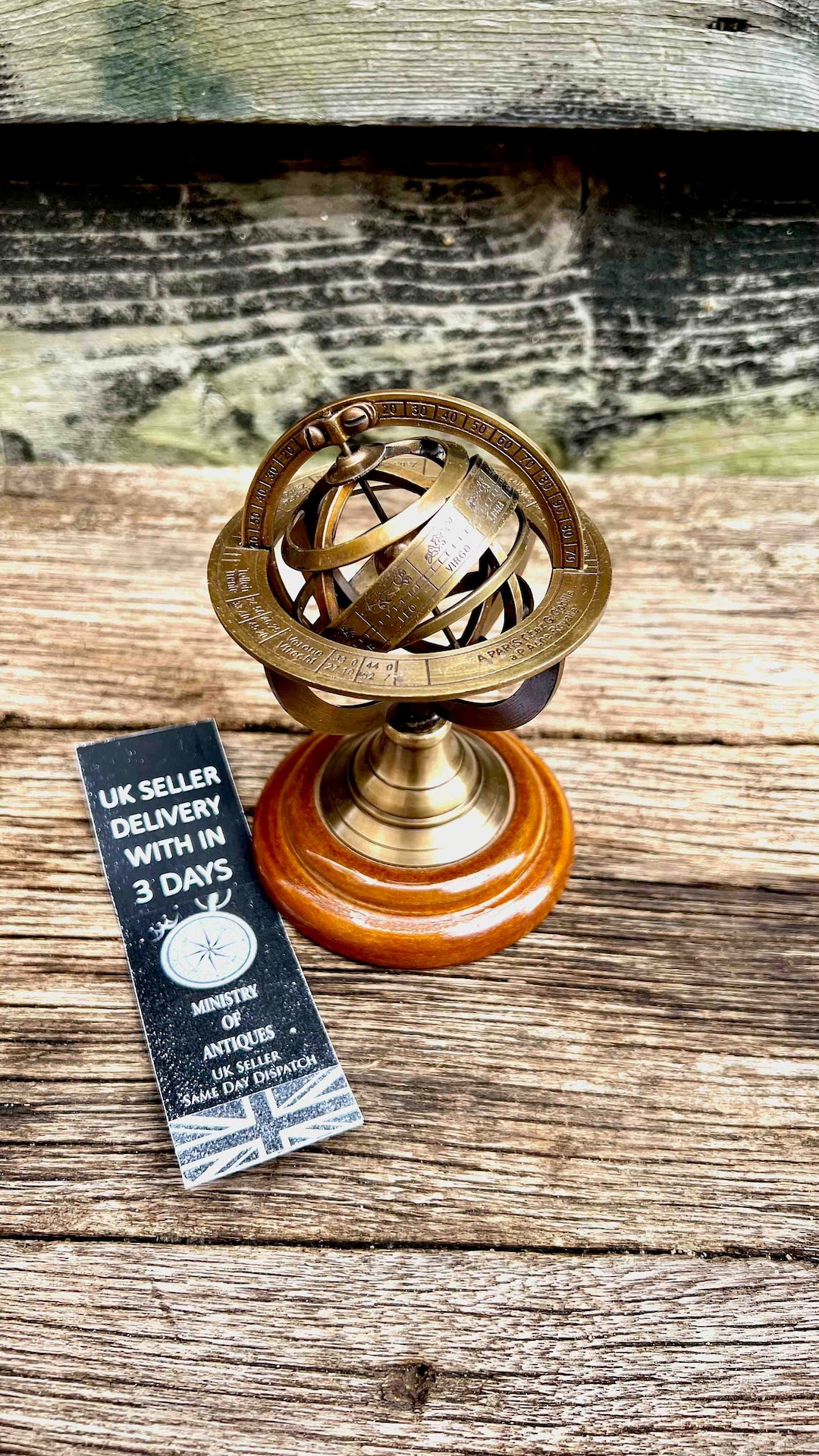 Vintage Armillary Sphere on Elegant Wooden Base: A Nostalgic Decor ...