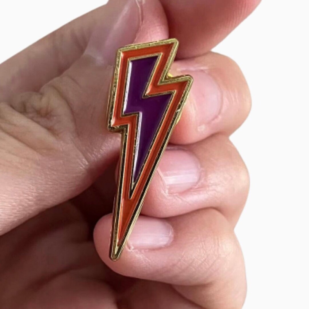 Lightening Bolt Pin Badge Gold Metal Based Pin Badge With Orange and ...