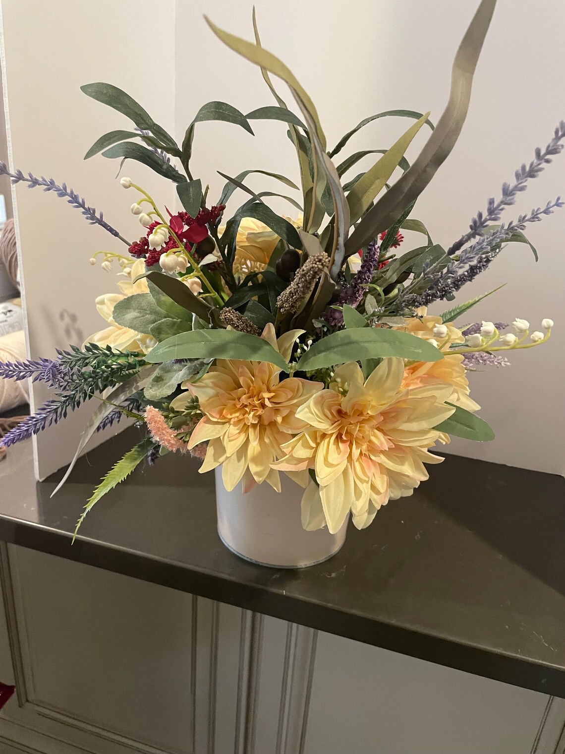 Cream Colored Tin Vase With Sunflowers on It and Yellow Flowers and ...
