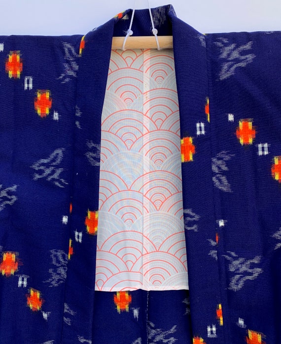 Indigo wool kasuri haori with red and white geometric… - Gem