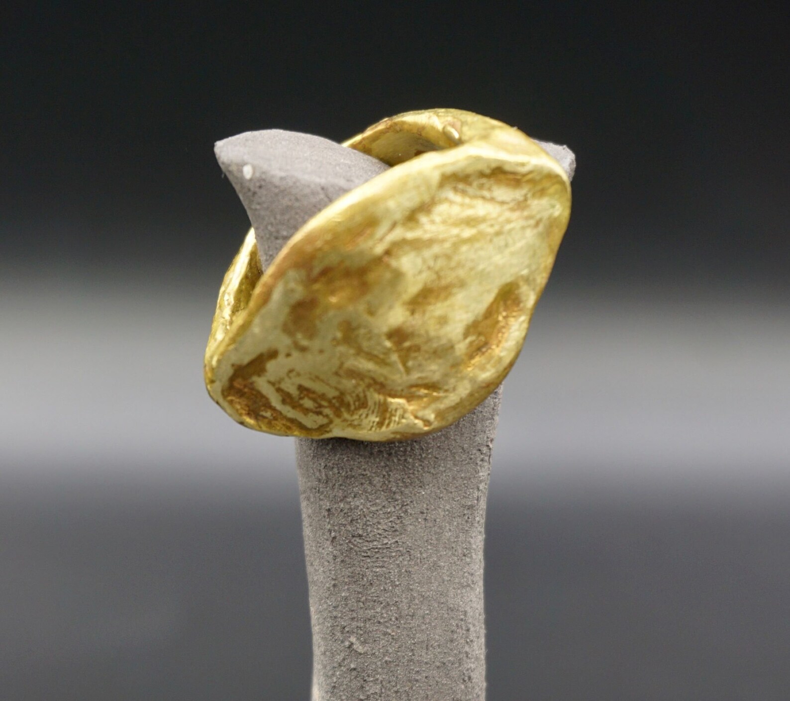 A Brass Ring With a Diamond-shaped Top , A Ring With a Geometric Shape ...