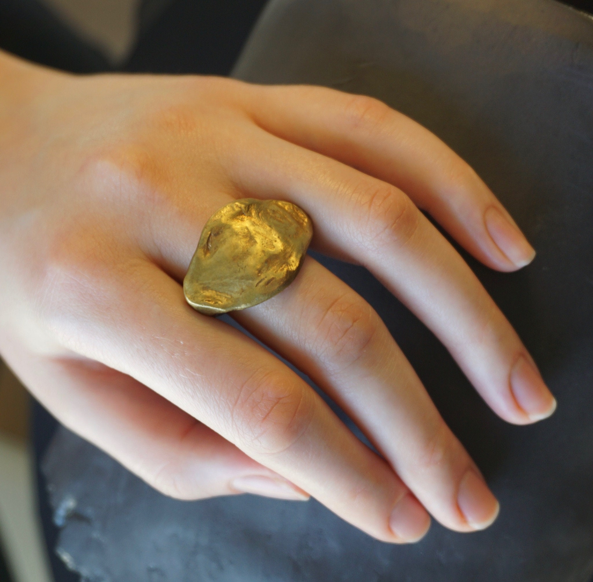 A Brass Ring With a Diamond-shaped Top , A Ring With a Geometric Shape ...