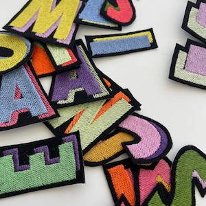 Letter Patches on Black Felt - DIY Iron on Colourful Letters for ...