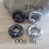 1x 00g 0g 2g 4g 6g 8g 12mm or 16mm Diameter Spring Action Black Plated ...