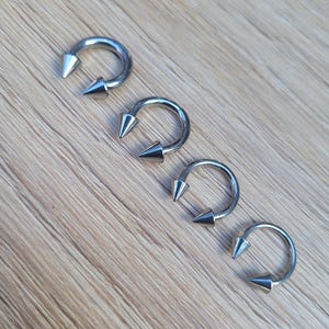 Set 4 Surgical Steel Spike Cone Horseshoes Septum Ears Tapers Pinchers ...