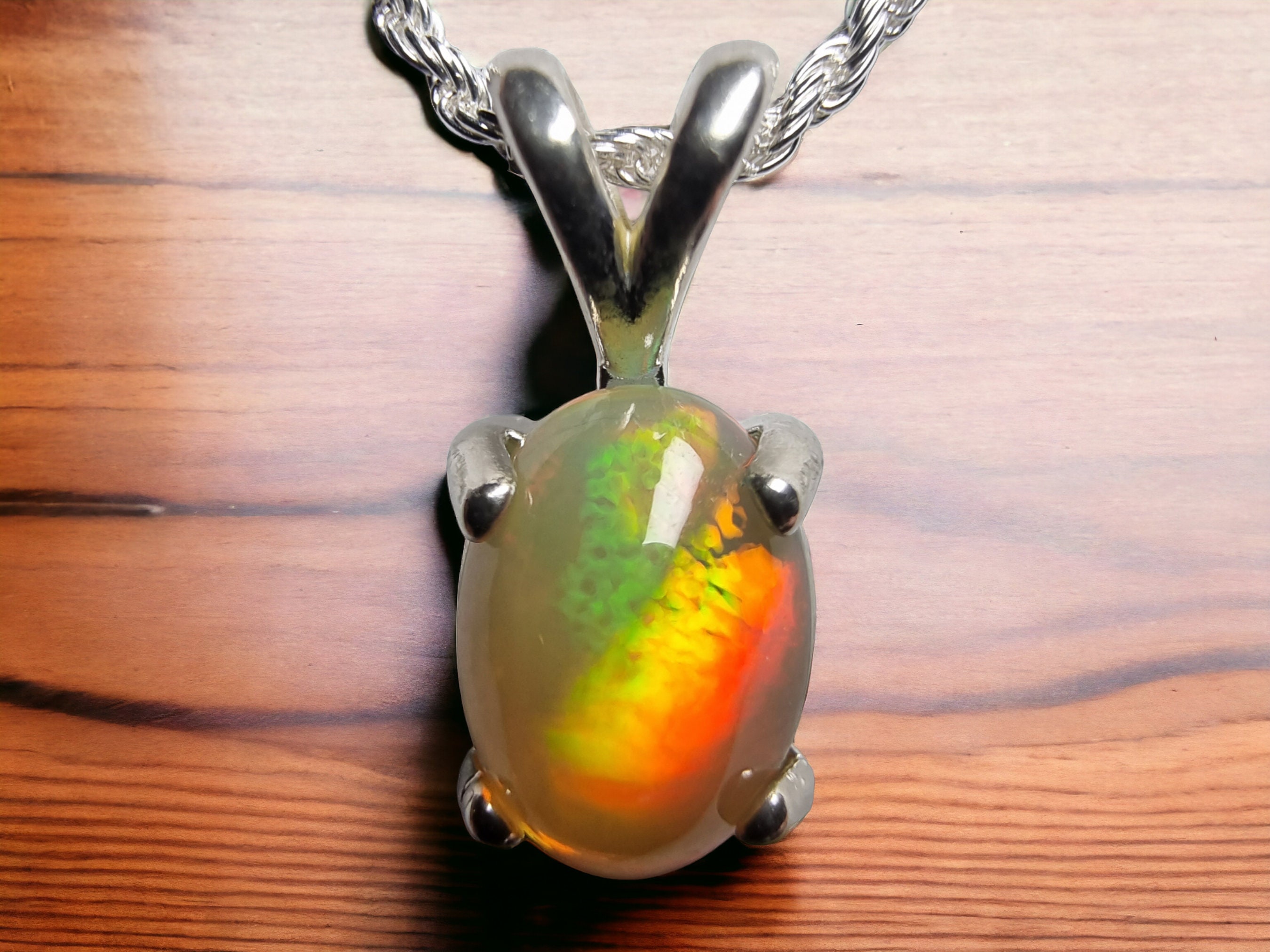 Natural African St Elmo's Fire Opal Pendant With A Stunning Diamond Cut ...