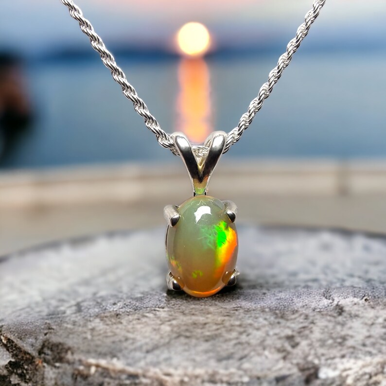 Natural African St Elmo's Fire Opal Pendant With A Stunning Diamond Cut ...