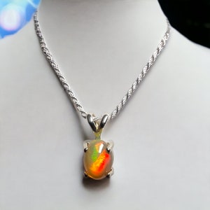 Natural African St Elmo's Fire Opal Pendant With A Stunning Diamond Cut ...