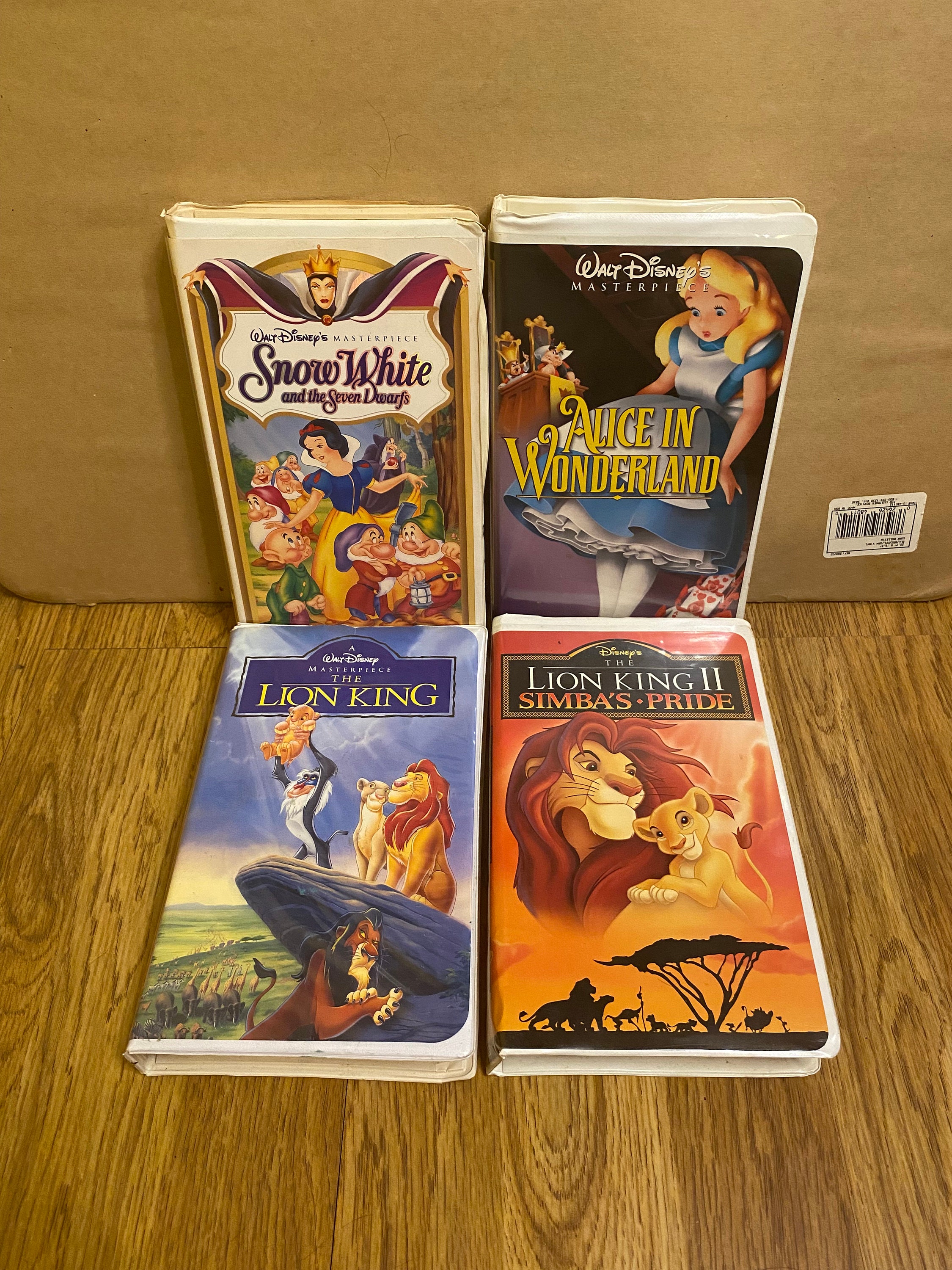 4 Disney VHS Tapes 90's Bundle. the Lion King. Alice in Wonderland ...