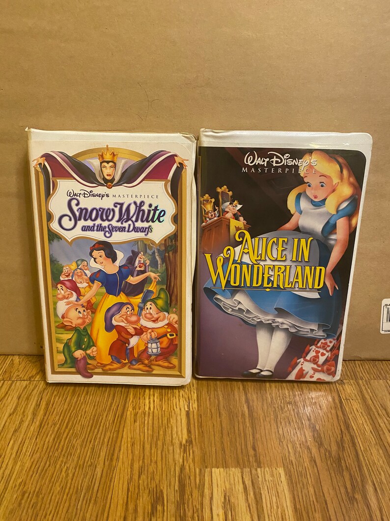 4 Disney VHS Tapes 90's Bundle. the Lion King. Alice in Wonderland ...