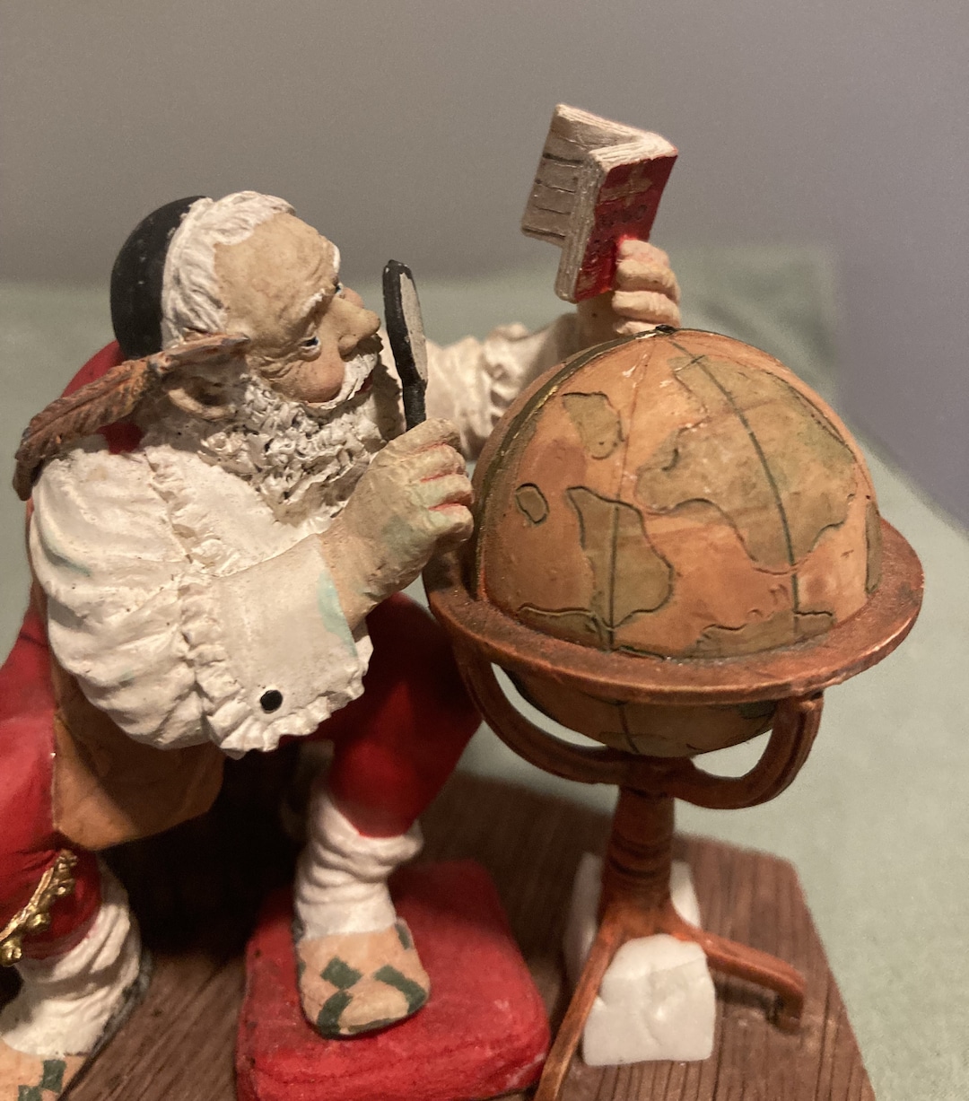 1999 Norman Rockwell santa at the Globe Figurine - Etsy