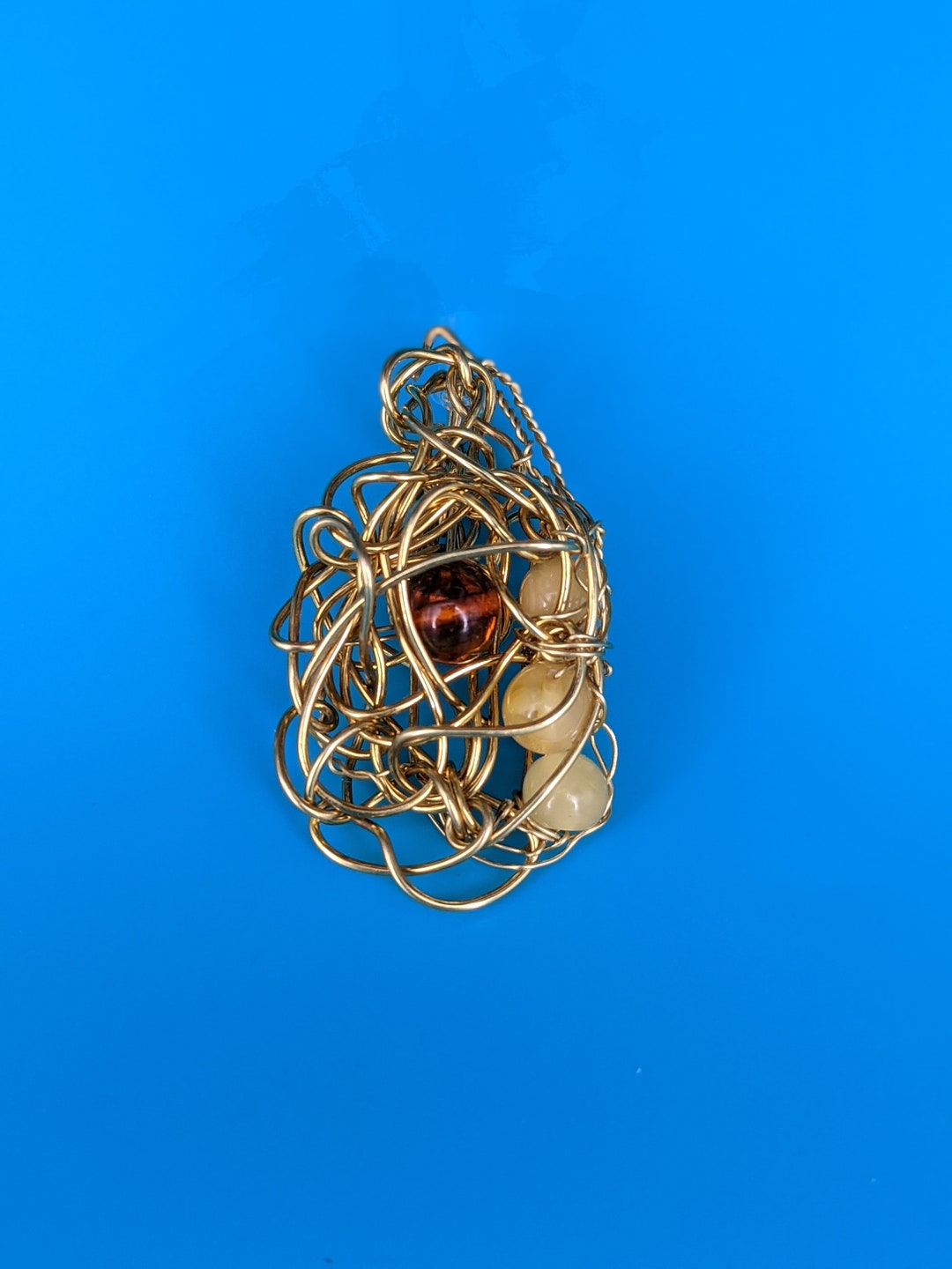 Pendant celebrity Knot memory Knot, Wirewrapart. Energy of the Gemstone ...