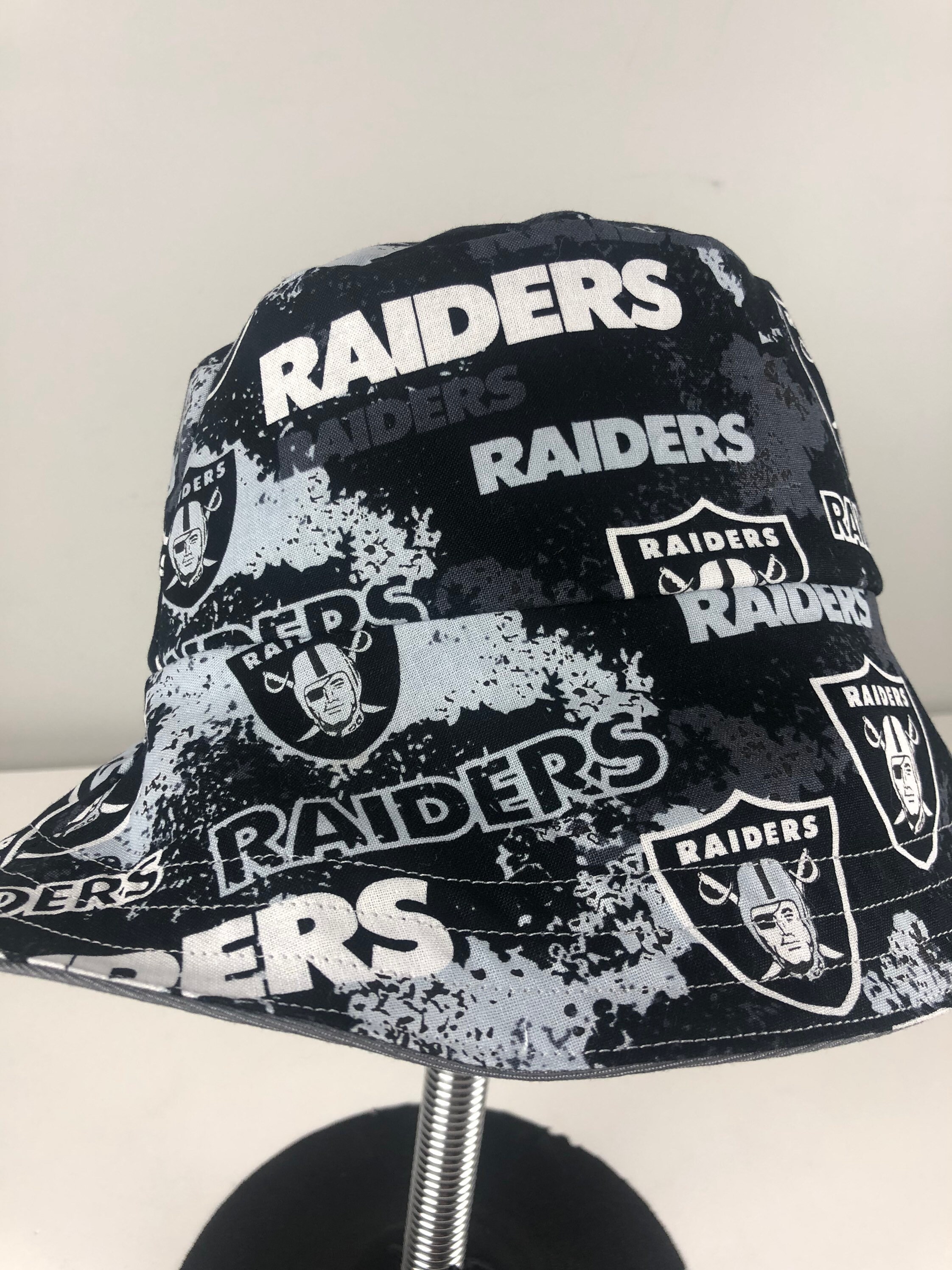 Reversible Bucket Hat of Las Vegas Raiders Stretch Denim Camo ...