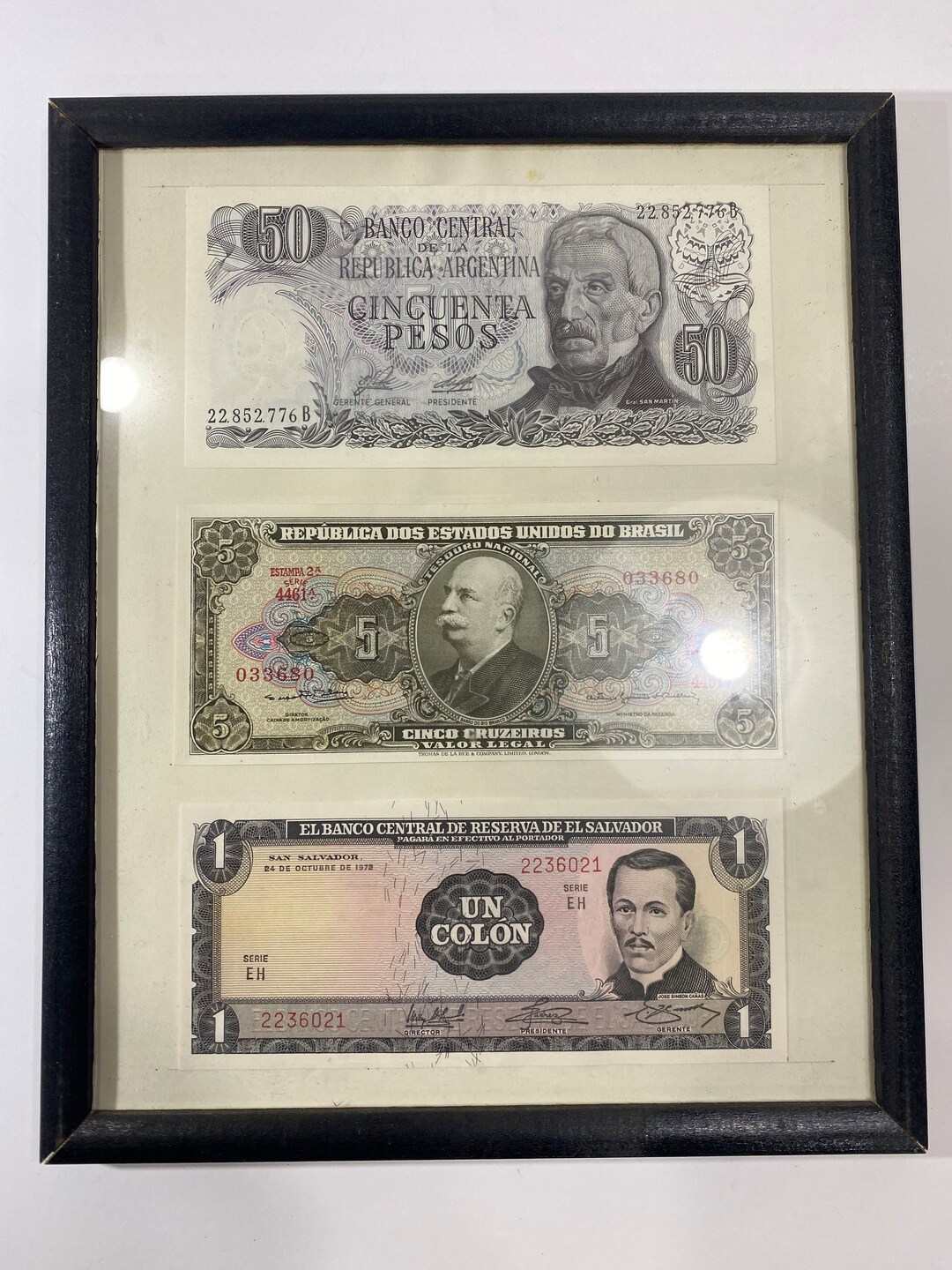 3 Framed Money Bank Notes, El Salvador 1 Colon, 5 Cruzeiros, 5 Pesos ...
