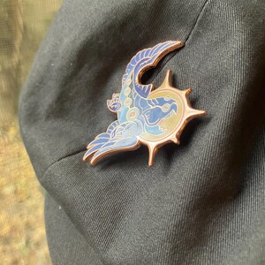 ANGEL SERIES: Dunkleostus Enamel Pin - Etsy
