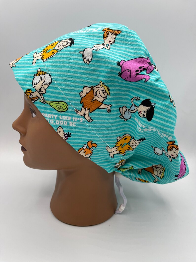 Women's Scrub Cap | Euro Style | Flintstones Party Like It’s 1000BC W ...