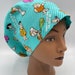 Women's Scrub Cap | Euro Style | Flintstones Party Like It’s 1000BC W ...