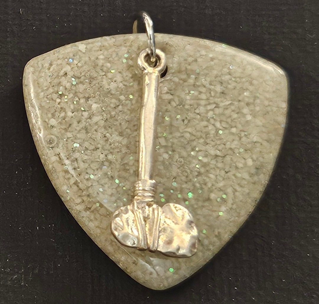 A Guitar Tri-pick Shaped Into the Color of Sand With a .925 Sterling ...