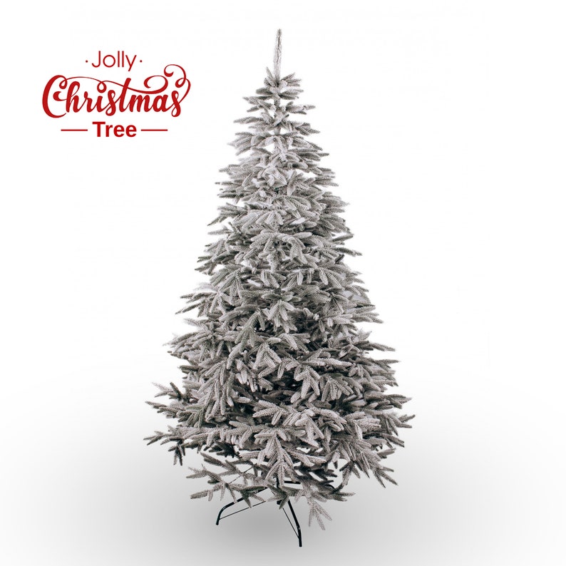 Artificial Christmas Tree With a Support. Christmas Tree With Snow ...