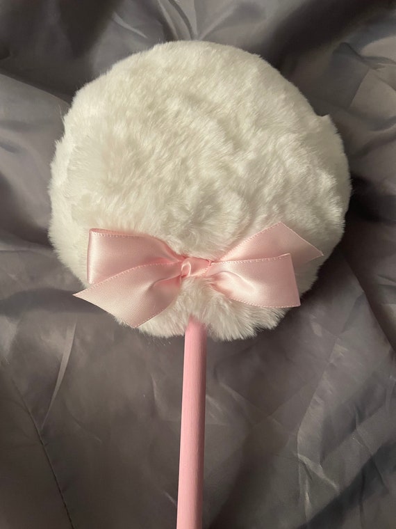 Body powder puff with handle store