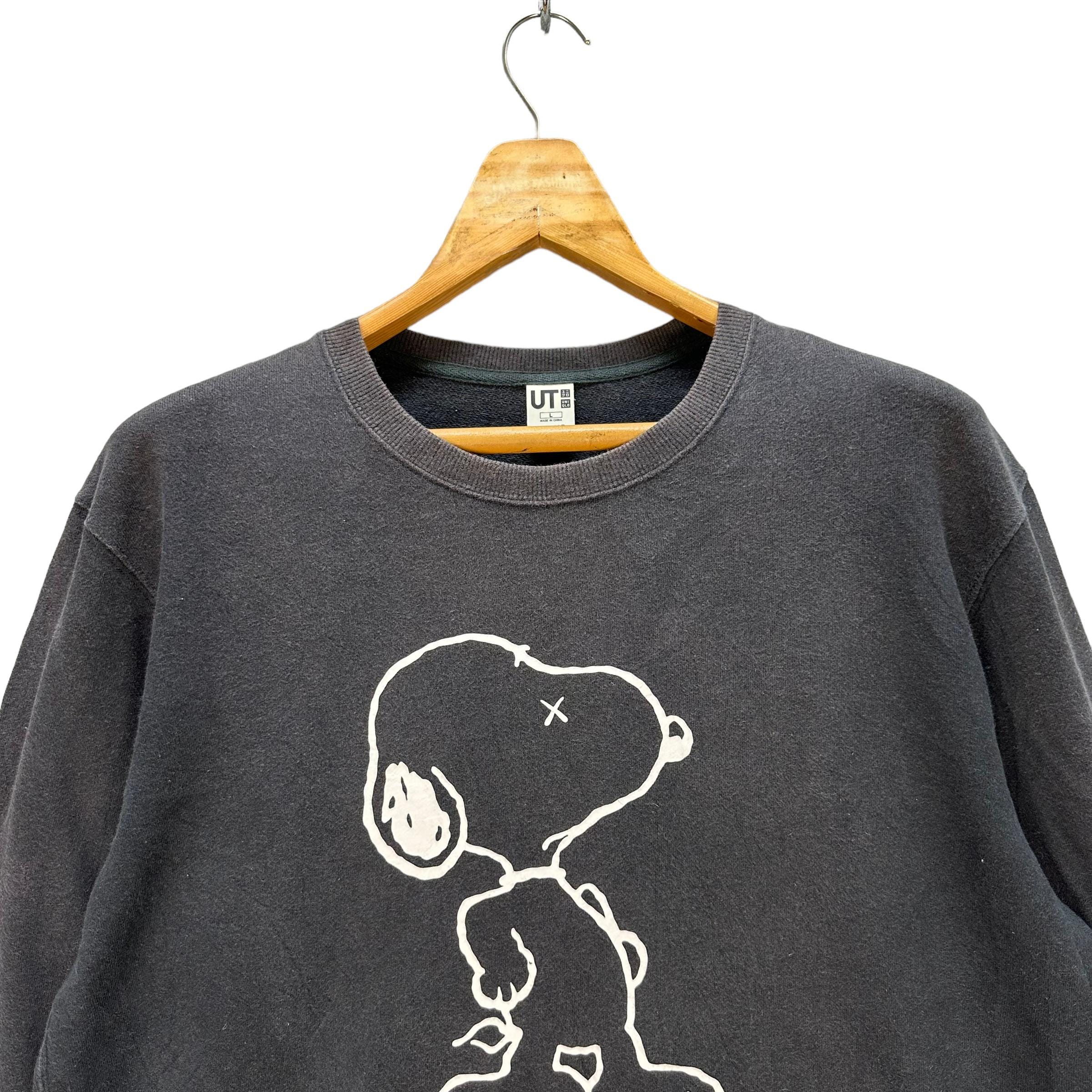 UT X Kaws X Peanuts Snoopy Skateboard Graphic Big Logo Crewneck ...