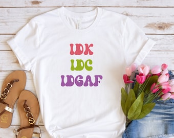 Stuck Between Idk Idc Idgaf Shirt - Etsy