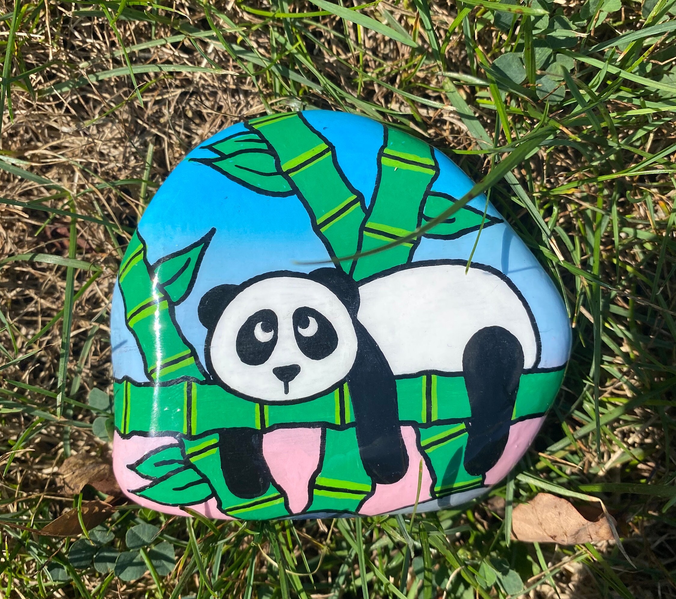 Hand Painted Panda Rock Panda Bear Sitting on Bamboo in a Sunset Garden ...
