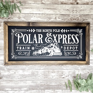 The North Pole Polar Express Train Depot Holiday Black Reverse Canvas ...