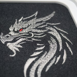 Silver Dragon Head Embroidery Design - Power Emblem for Dark Fabric ...