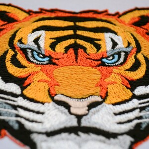 Captivating Tiger Face Embroidery Design - Vibrant Cartoon Style, Fill ...