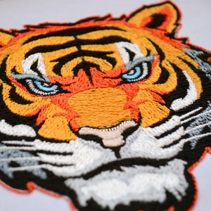 Captivating Tiger Face Embroidery Design - Vibrant Cartoon Style, Fill ...