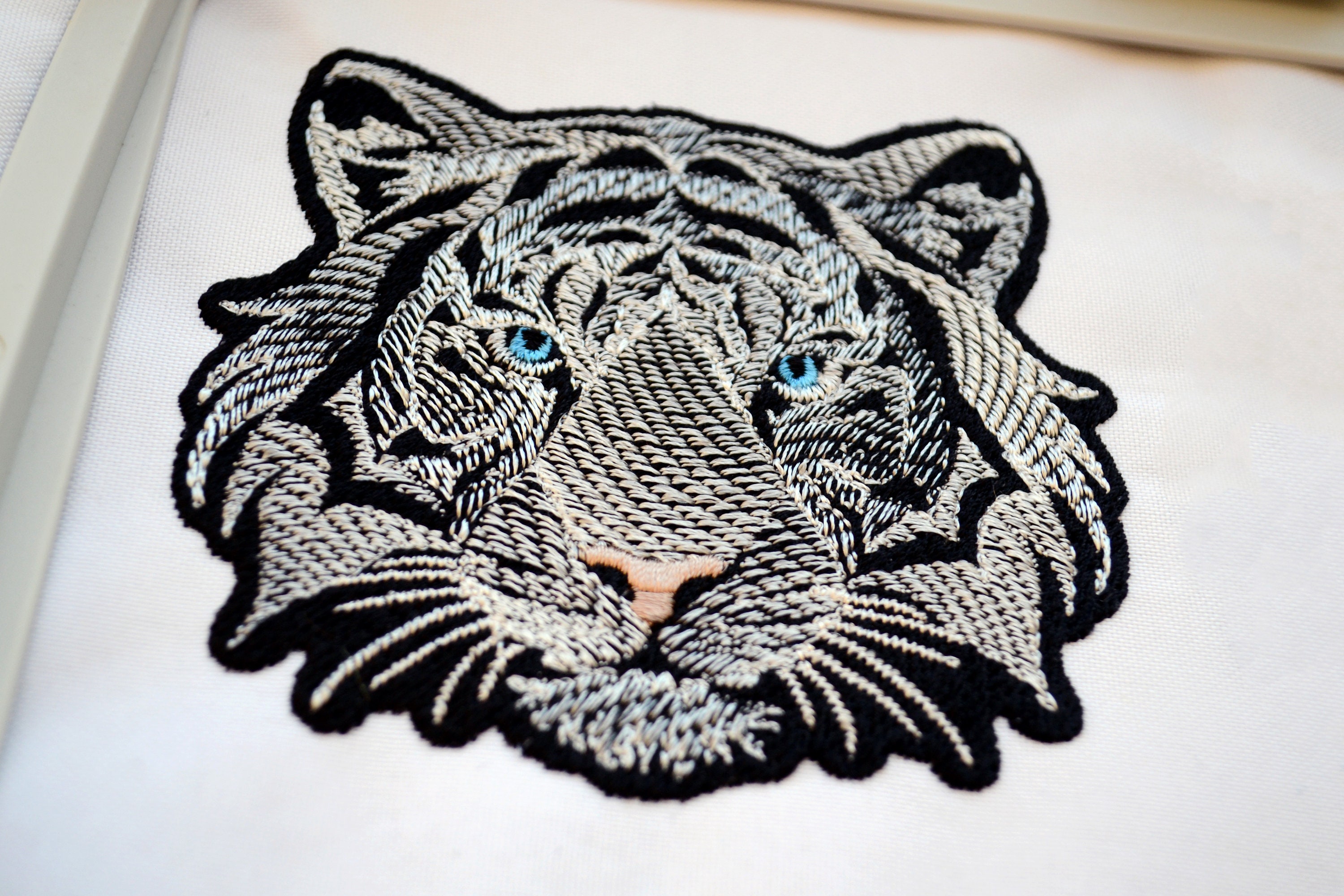 White Tiger Embroidery Design on Black Stitched Underlay - Wild Jungle ...