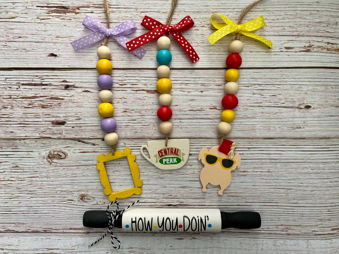 Friends Tiered Tray Decor Collection, Canister Garland Ornament ...