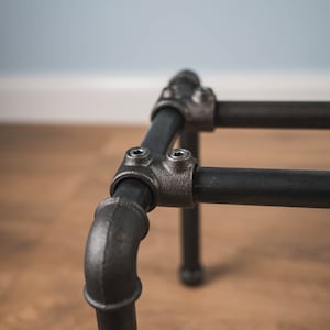 Free-standing Metal Pipe Shoe Rack | Minimalist Industrial Shoe Storage ...