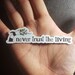 Never Trust the Living Sticker - Etsy
