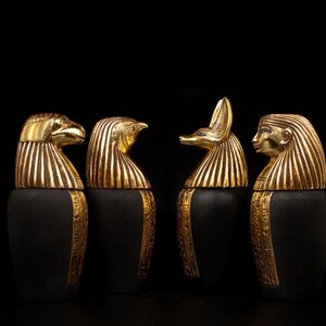 Ancient Egyptian Canopic Jars Set Symbol of Eternity and Royal Funerary ...