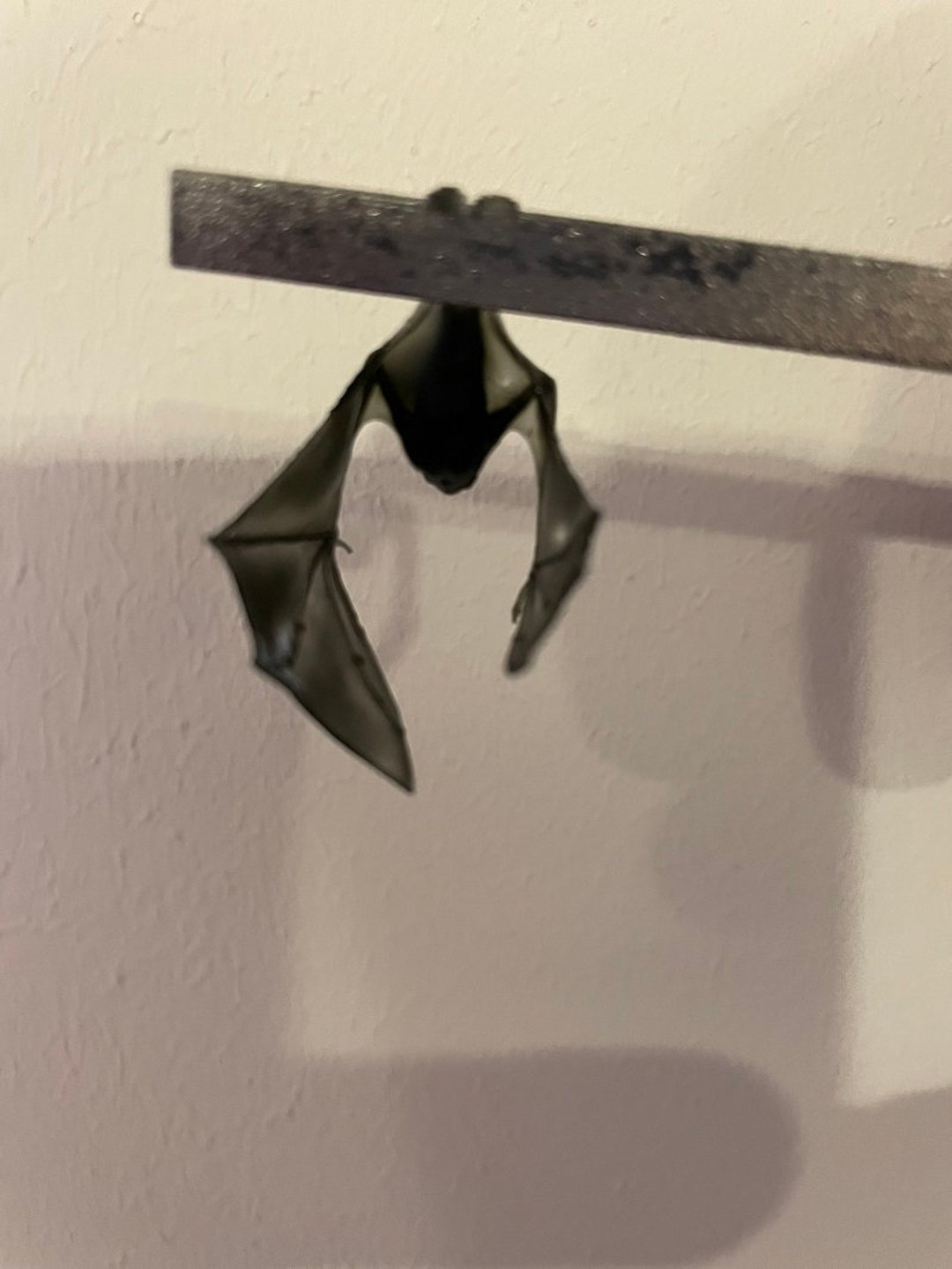 Little Miniature Hanging Bat With Folded Wings,| Miniature Animal ...
