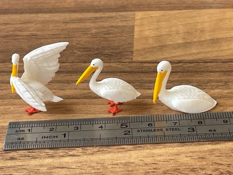 Miniature Pelican Figurine: Hand-painted Resin Coastal Decor - Etsy